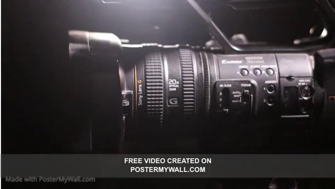 Photographer shooting video | PosterMyWall