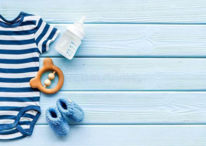 Copy of Blue Joyful Flat Lay Baby Boy Essentials On Blue Wooden ...