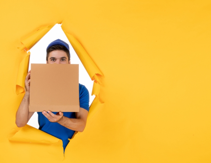 Copy of Front view male courier holding pizza box | PosterMyWall